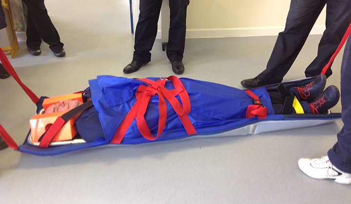 Ski-Slide-Pad Emergency Evacuation Device